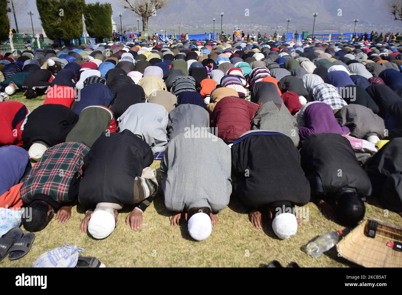 Kashmiri muslims offer prayers at Hazratbal shrine on Friday following ...
