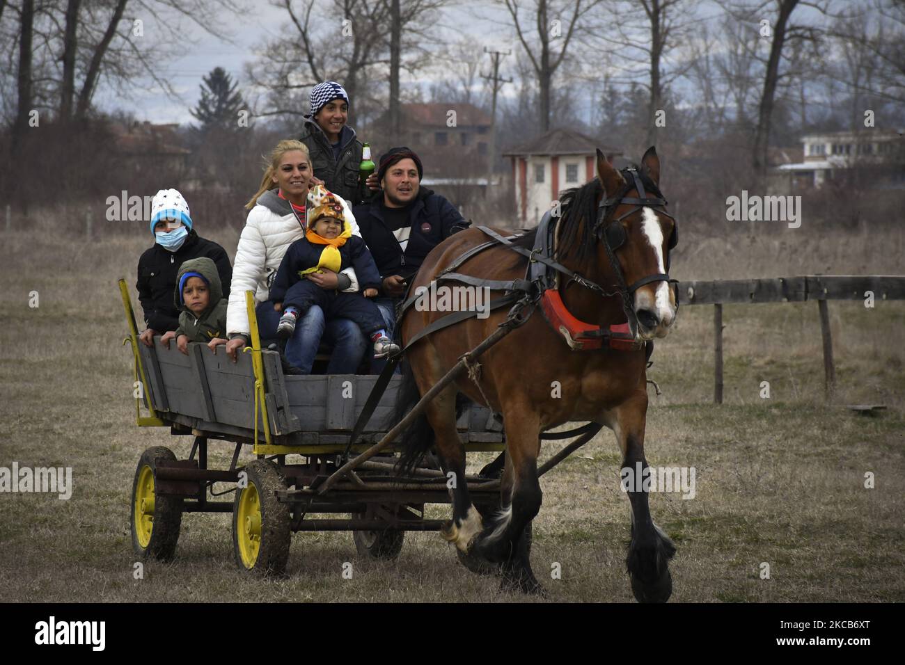 Gypsy family on horse wagon during celebration of Todorov Den also ...