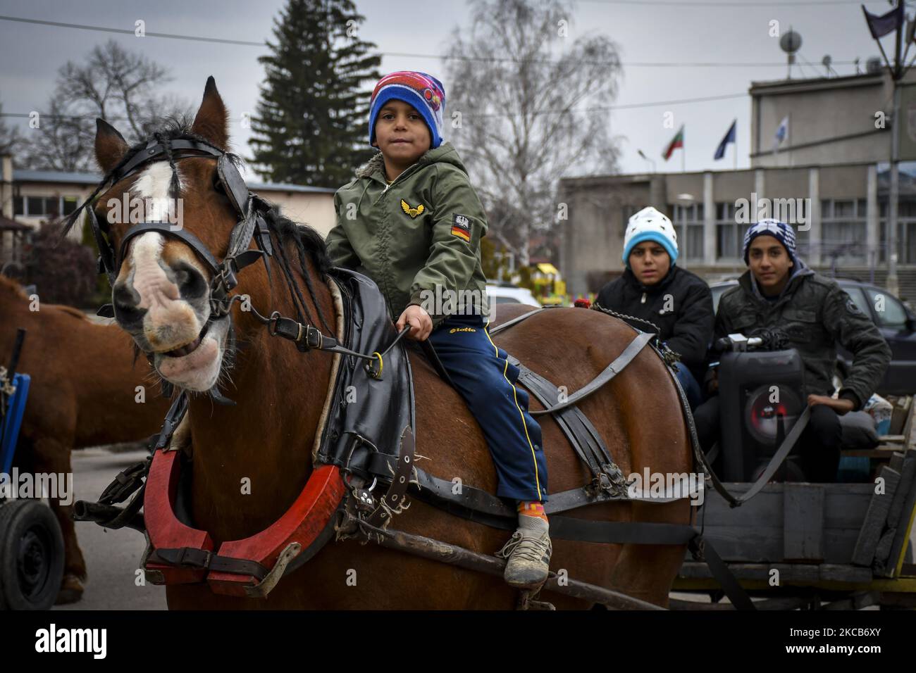 Gypsy boy riding a horse during celebration of Todorov Den also known ...