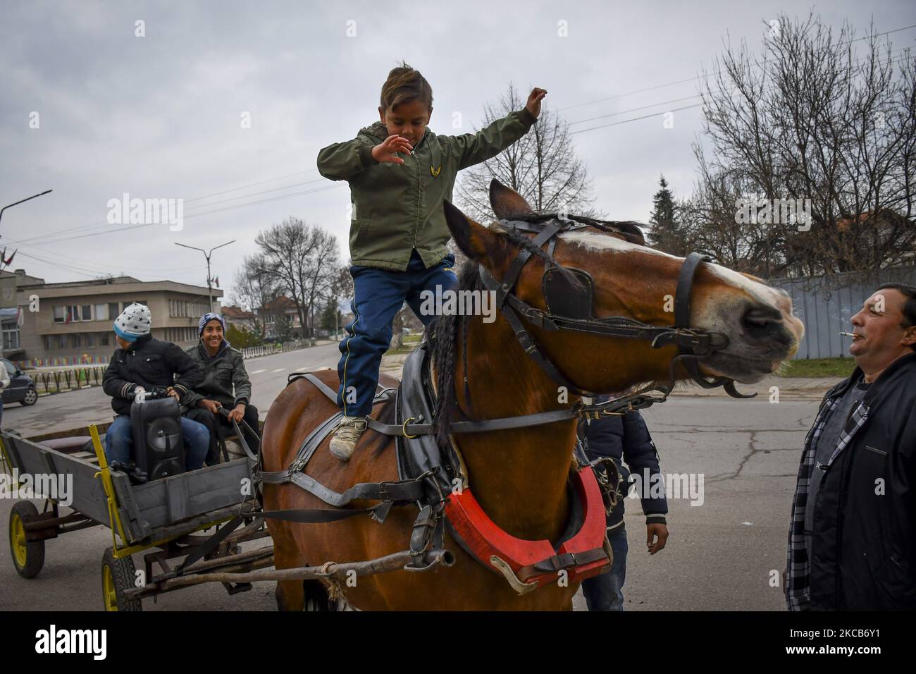 Gypsy boy riding a horse during celebration of Todorov Den also known ...