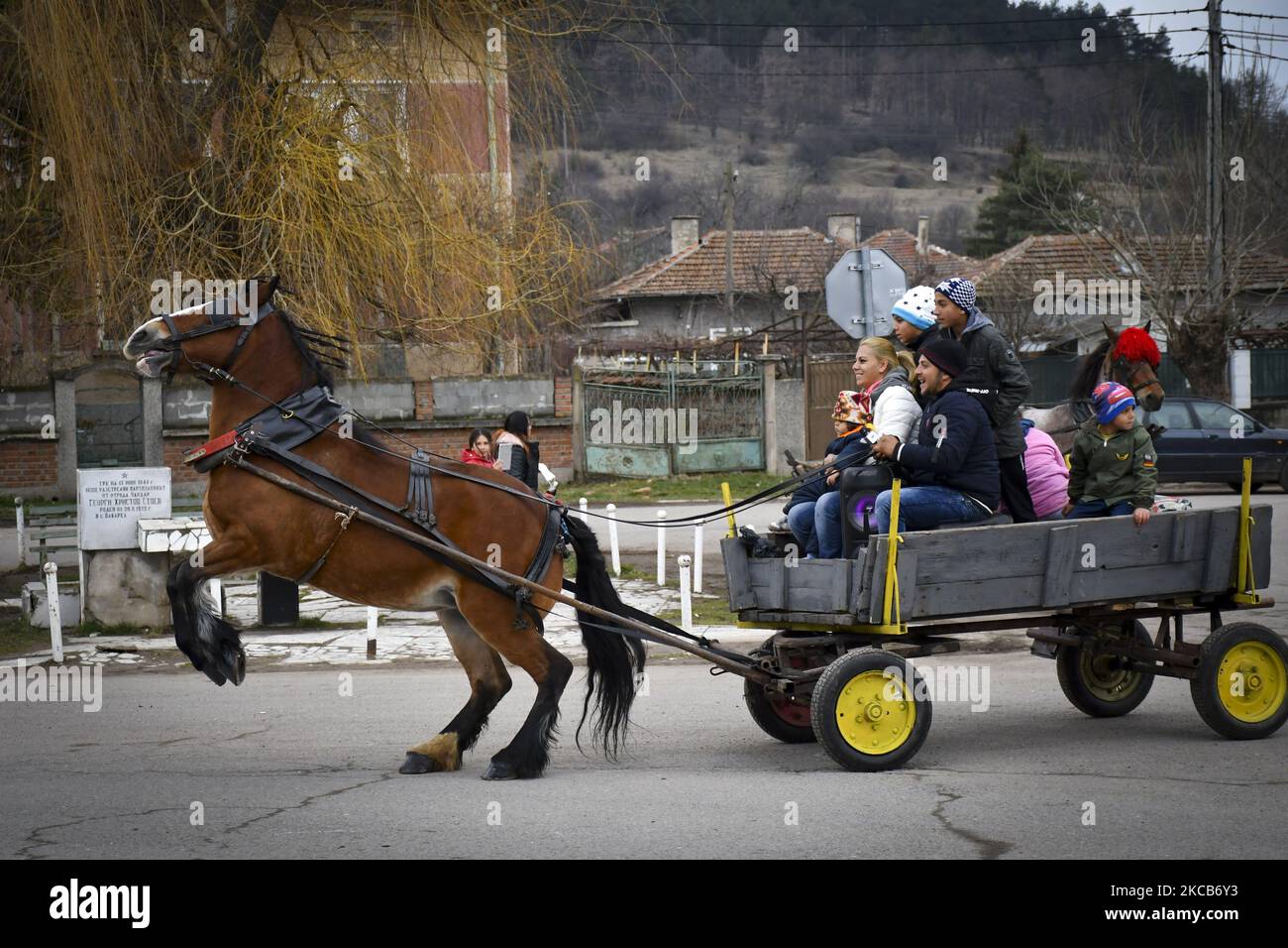 Gypsy family on horse wagon during celebration of Todorov Den also ...