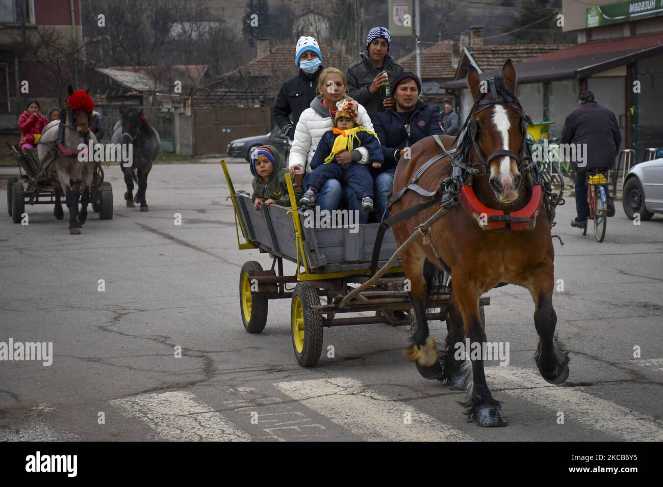 Gypsy family on horse wagon during celebration of Todorov Den also ...