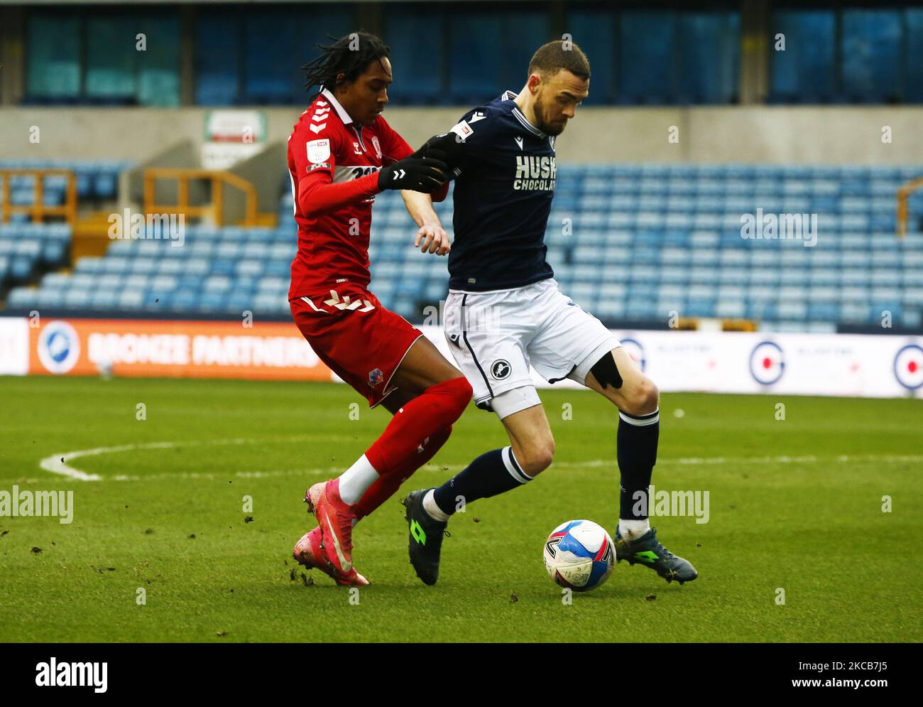 Scott Malone of Millwall holds of Djed Spence of Middlesbrough during ...