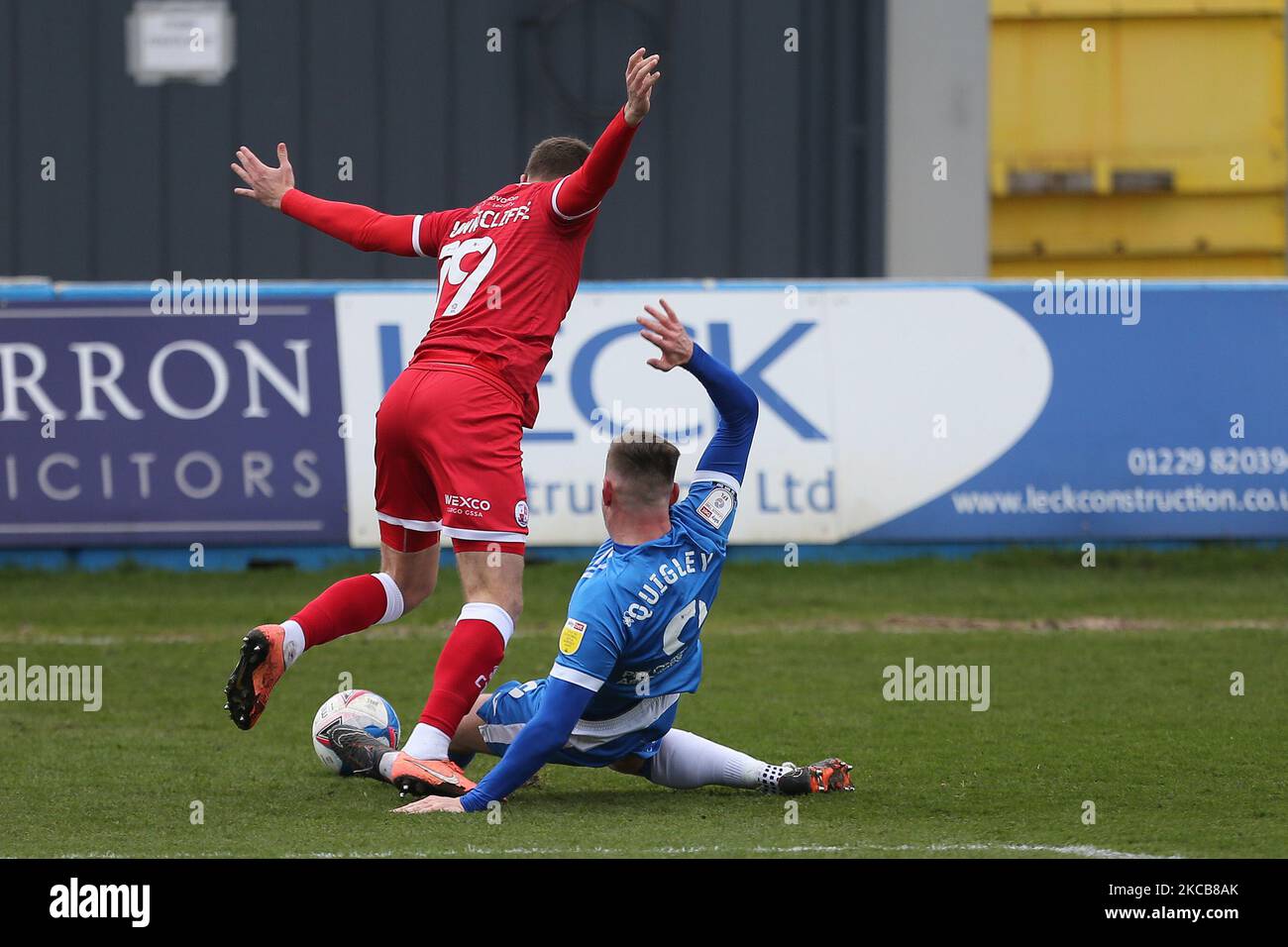 w9 of Barrow battles with Crawley Town's Jordan Tunnicliffe during the ...