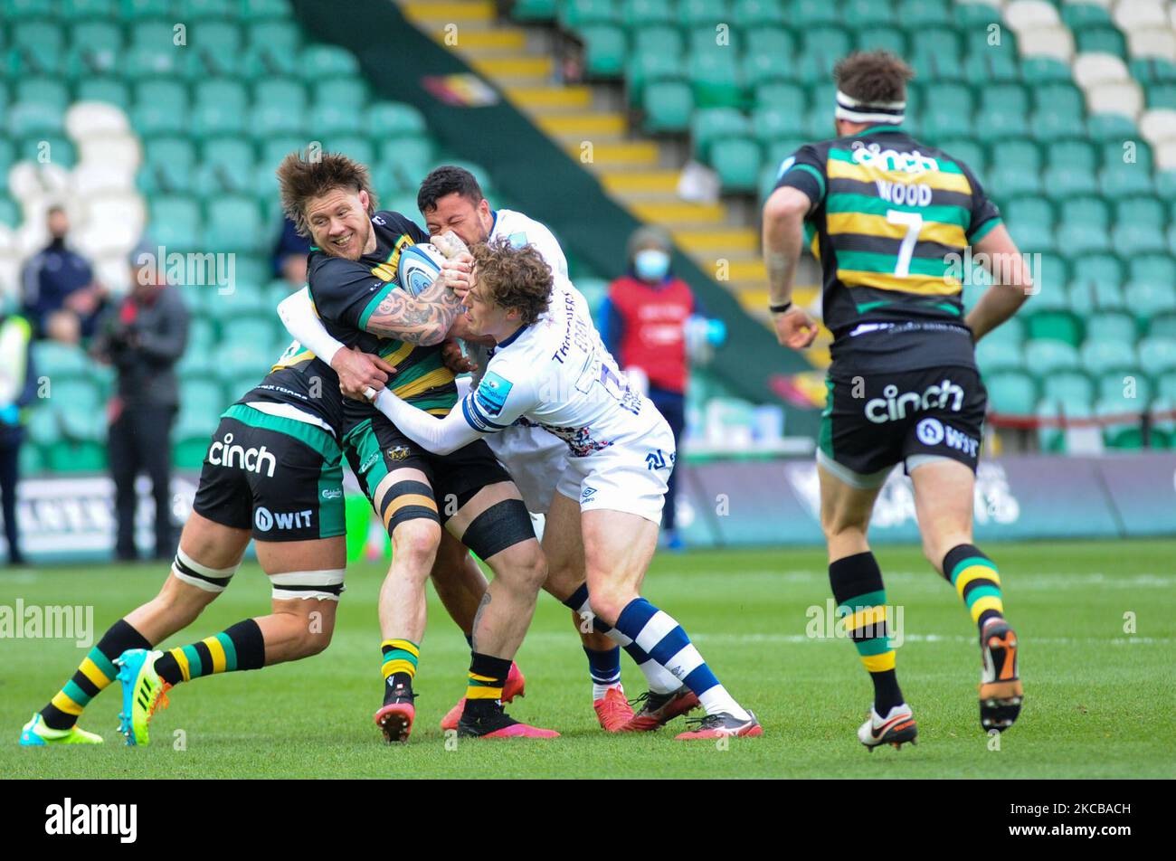 Bristols Tiff Eden tackles Northamptons Teimana Harrison during the ...