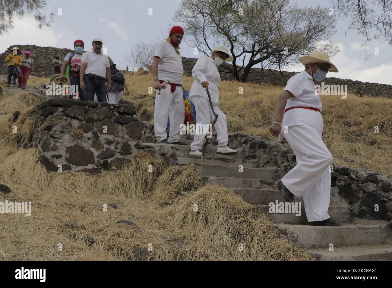 A family descends the archaeological site of Cerro de la Estrella ...