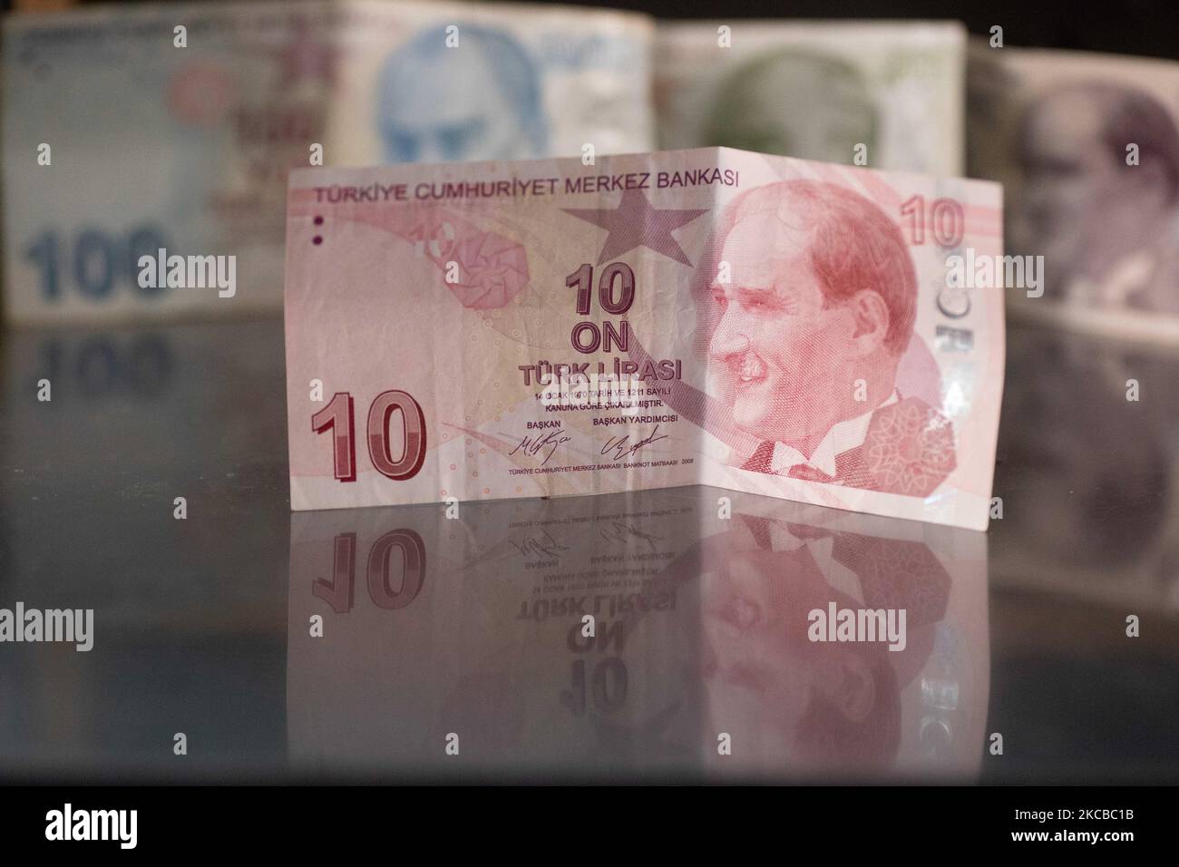 Illustration with reflection of Turkish lira banknotes, the currency of ...