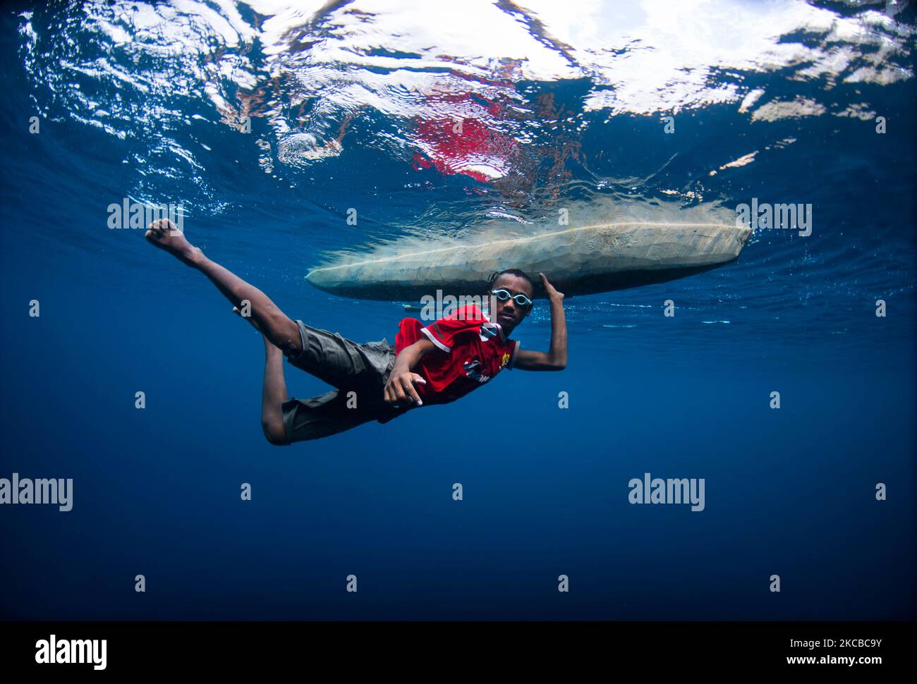 Local fisherman with his out-rigger in the Banda Sea, Indonesia Stock ...