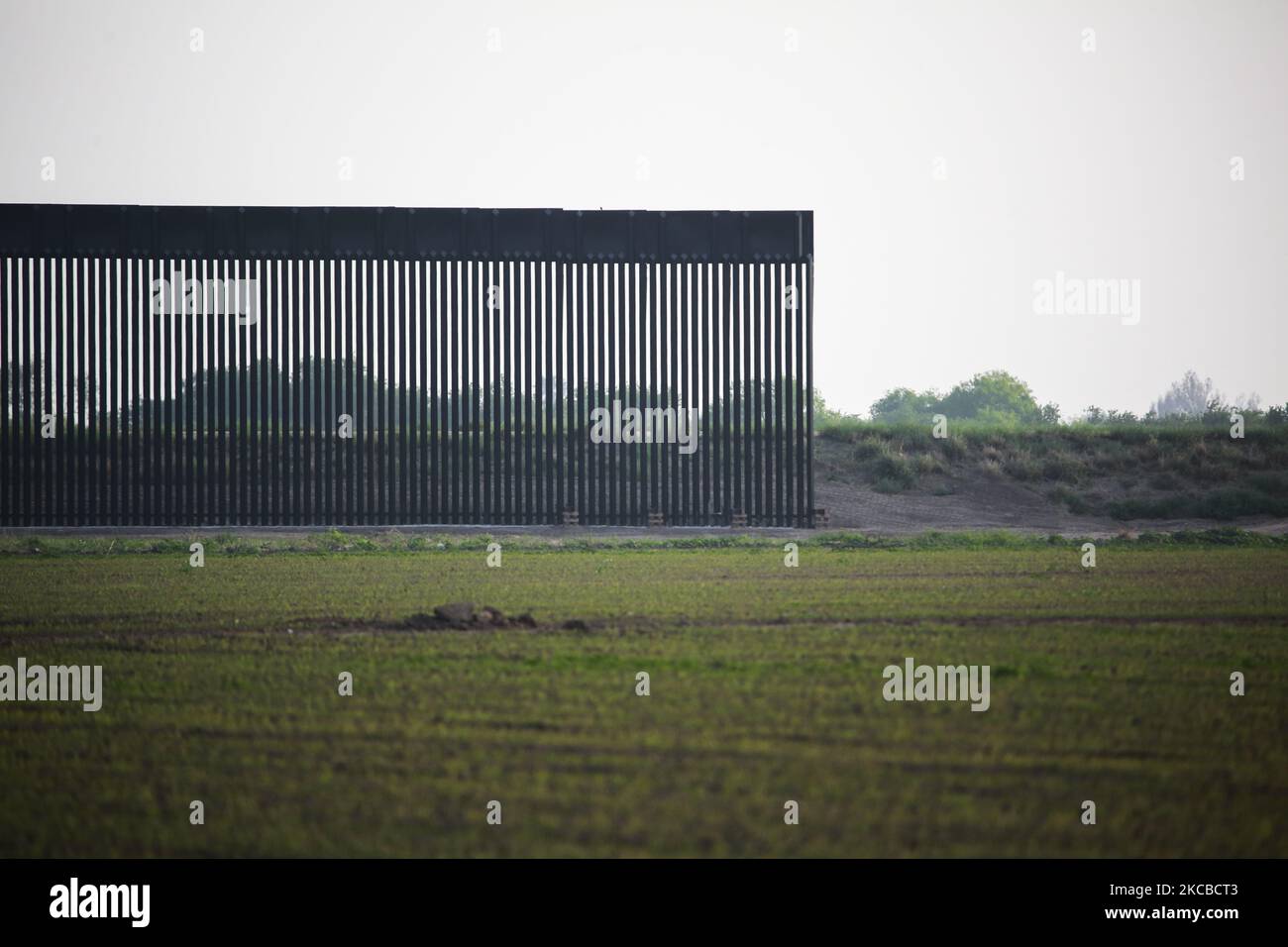 Many large unfinished gaps in border fencing can be seen in the ...