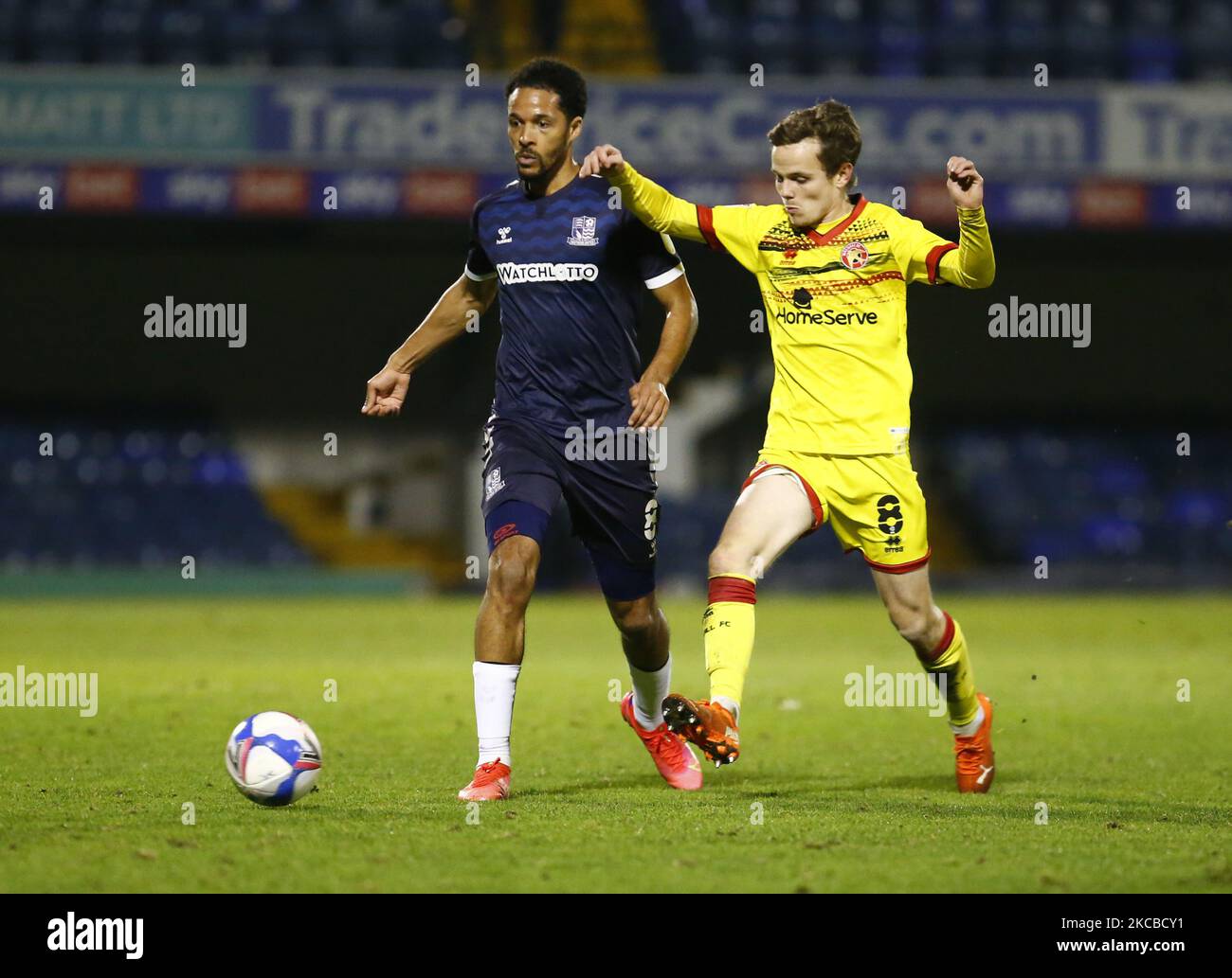 L-R Timothee Dieng of Southend United and Liam Kinsella of Wallsall ...