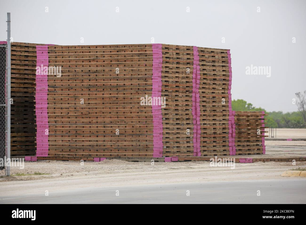 Construction materials litter the inside of the gating at the temporary ...