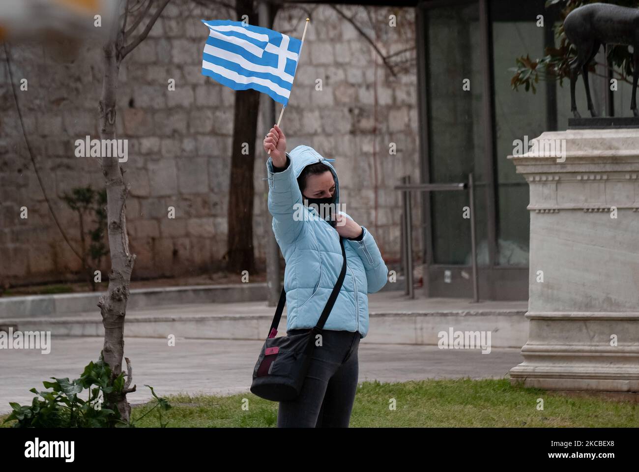 People holding Greek flags, went at Syntagma Square to see the ...