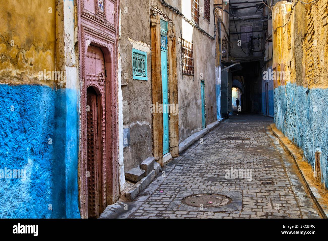 Laneway in the historic in the medina (old city) of Fez in Morocco ...