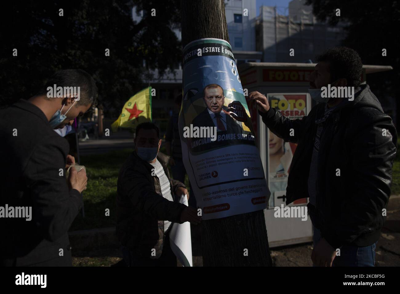 People Attach A Poster Depicting Turkeys President Recep Tayyip
