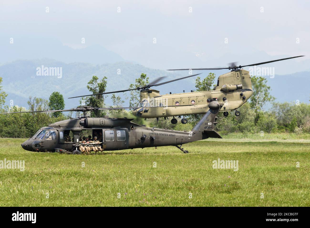 A U.S. Army UH-60M Black Hawk and CH-47F Chinook helicopter at Juliet ...