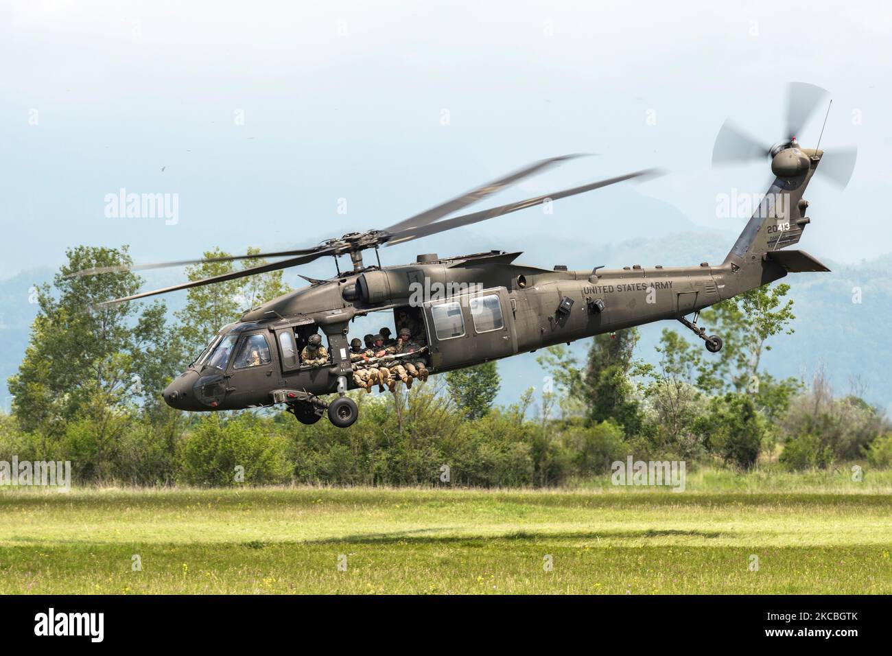 A U.S. Army UH-60M Black Hawk helicopter at Juliet Drop Zone, Italy ...