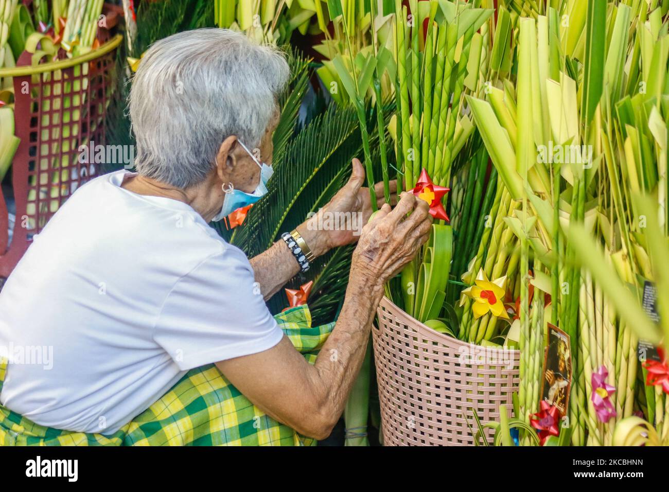 Vendors beside Antipolo Cathedral are selling woven palm leaves ...