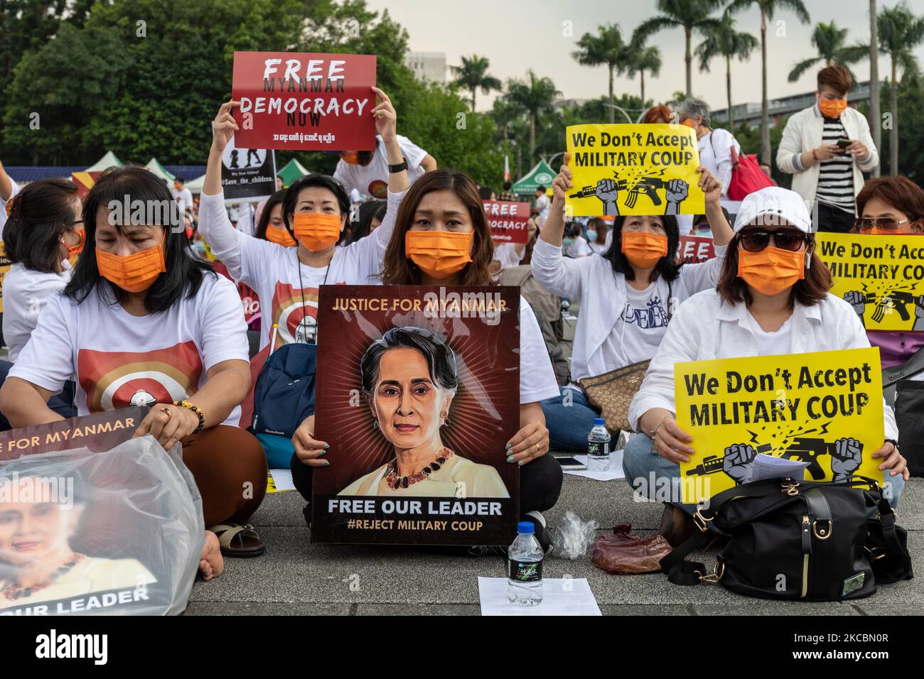Group of Woman holding sign reading ''Free Myanmar'', ''We don't accept ...
