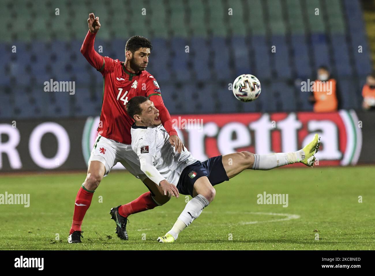 Andrea Belotti of Italy (R) is challenged by Daniel Dimov of Bulgaria during the FIFA World Cup ...