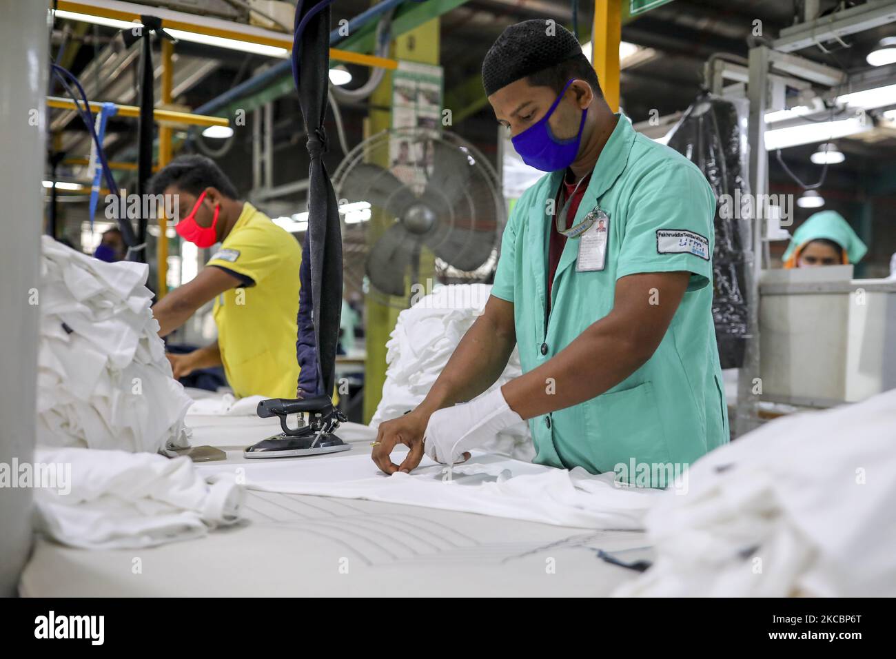 Ready made garments worker works in a garments factory in Gazipur ...