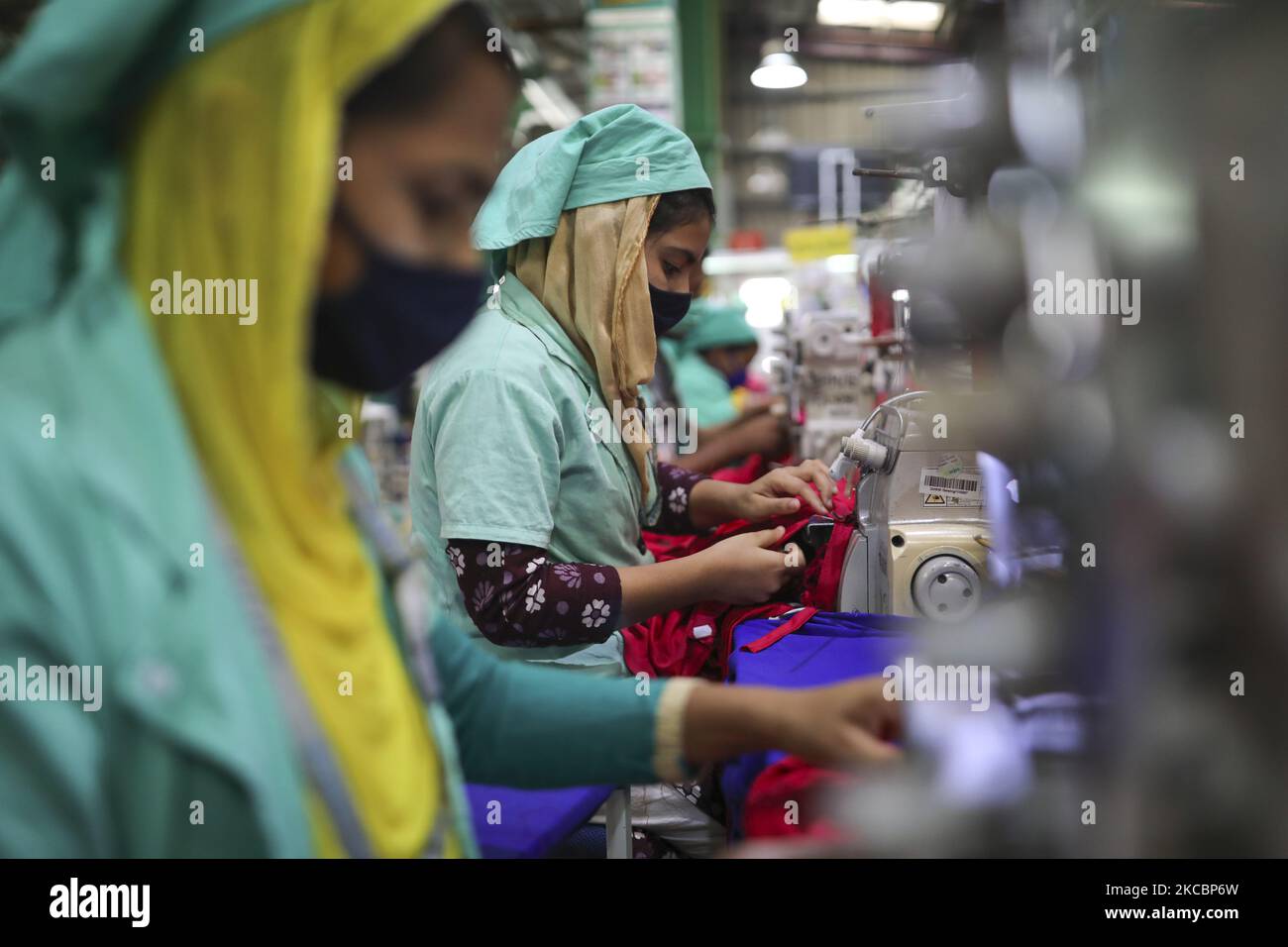Ready made garments worker works in a garments factory in Gazipur ...