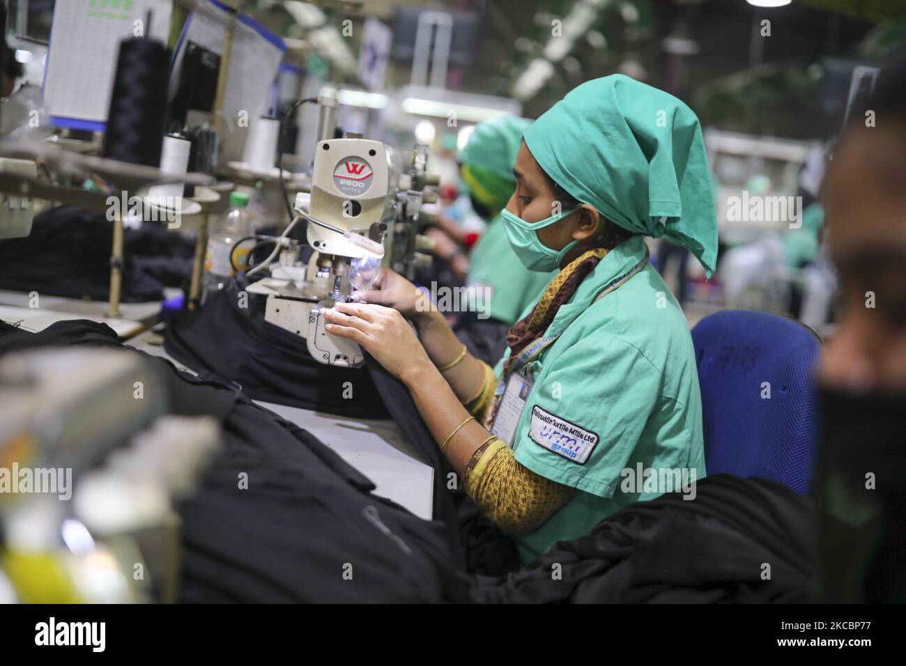 Ready made garments worker works in a garments factory in Gazipur ...