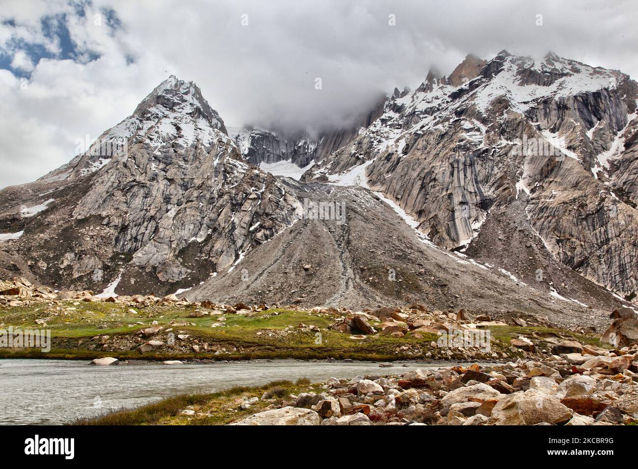 Himalayan mountains surround glacial lake in a remote valley in Zanskar ...