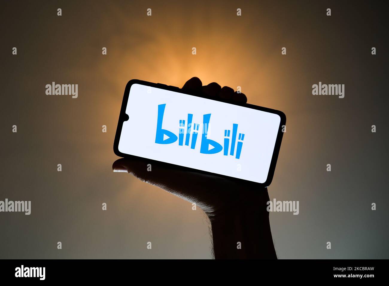 Bilibili logo is seen on a phone screen in this illustration photo ...