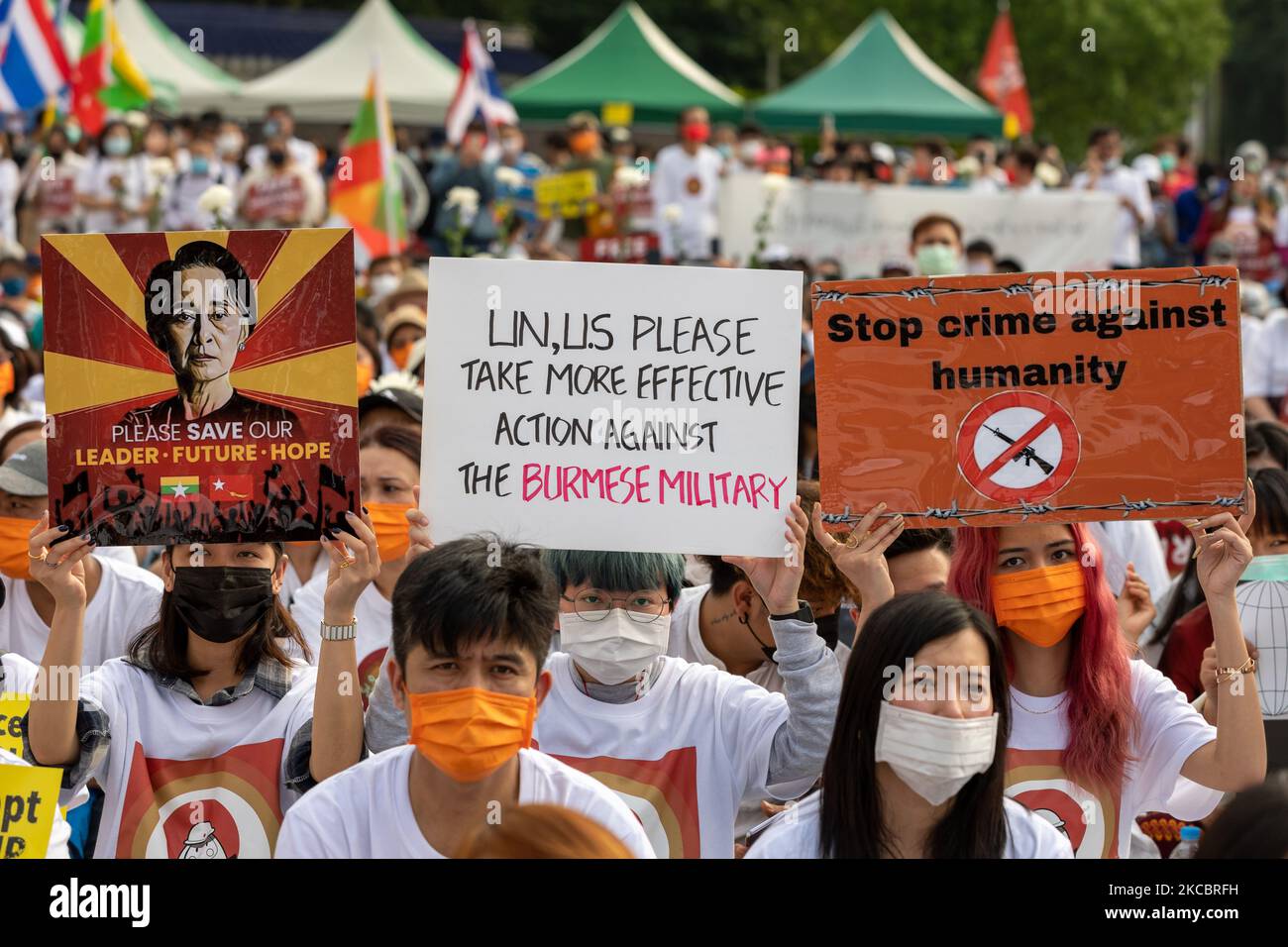 Burmese People holding signs and shouting anti-Myanmar Military coup ...