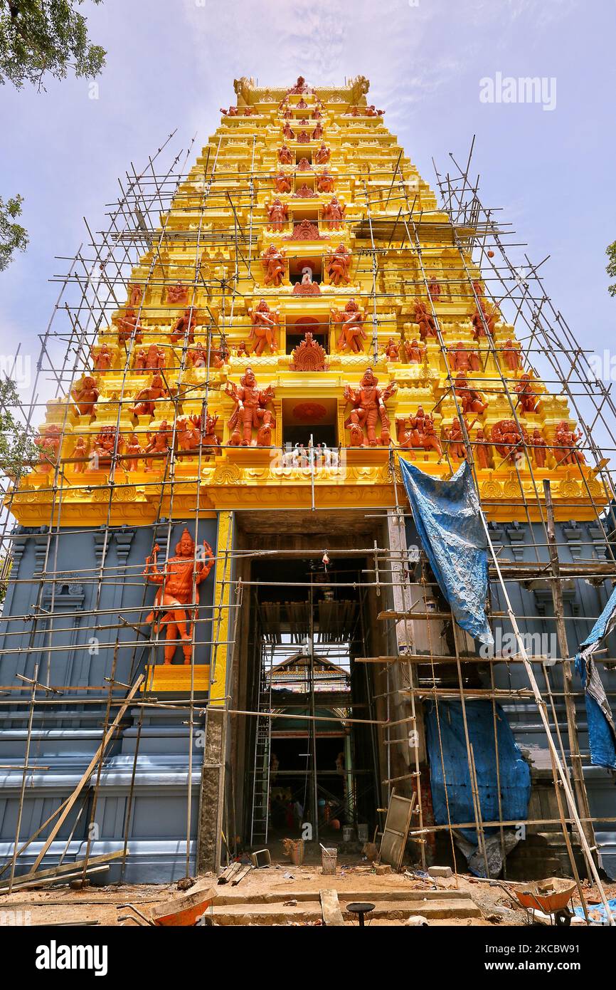 Workers complete re-construction of the Raja Gopuram at the Keerimalai ...
