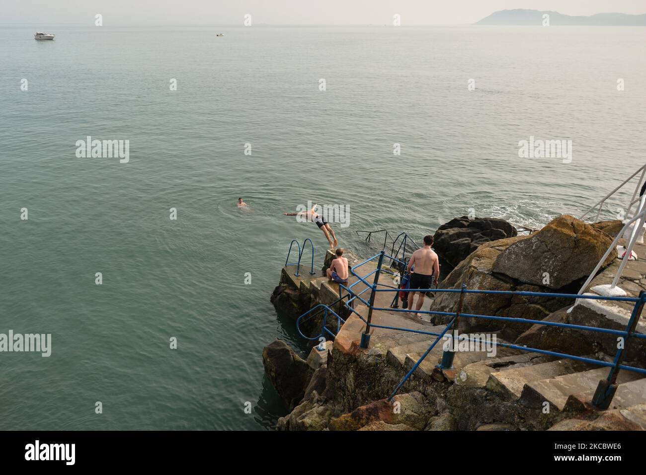 People seen at the Vico bathing place, Hawk Cliff, in Dalkey, during ...