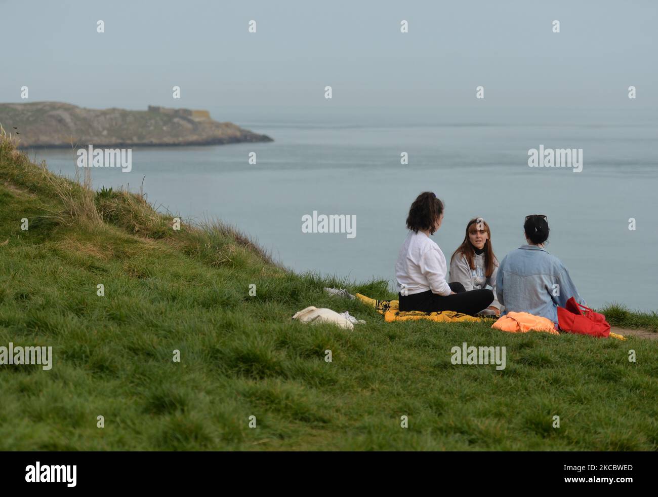 People enjoy nice weather near the Vico bathing place, Hawk Cliff, in ...