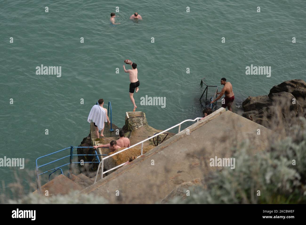 People seen at the Vico bathing place, Hawk Cliff, in Dalkey, during ...