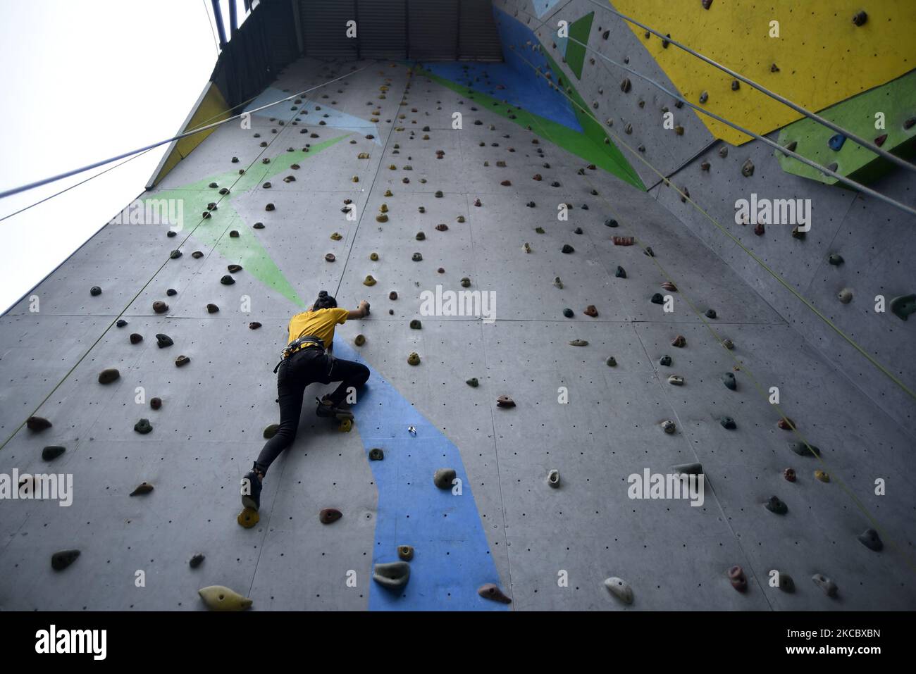 A visually impaired girl tries to climb wall in Astrek Climbing wall at ...