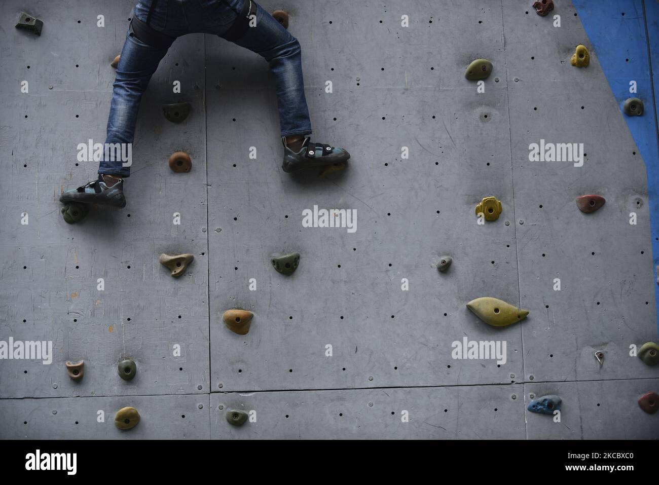 A visually impaired youth tries to climb wall in Astrek Climbing wall ...