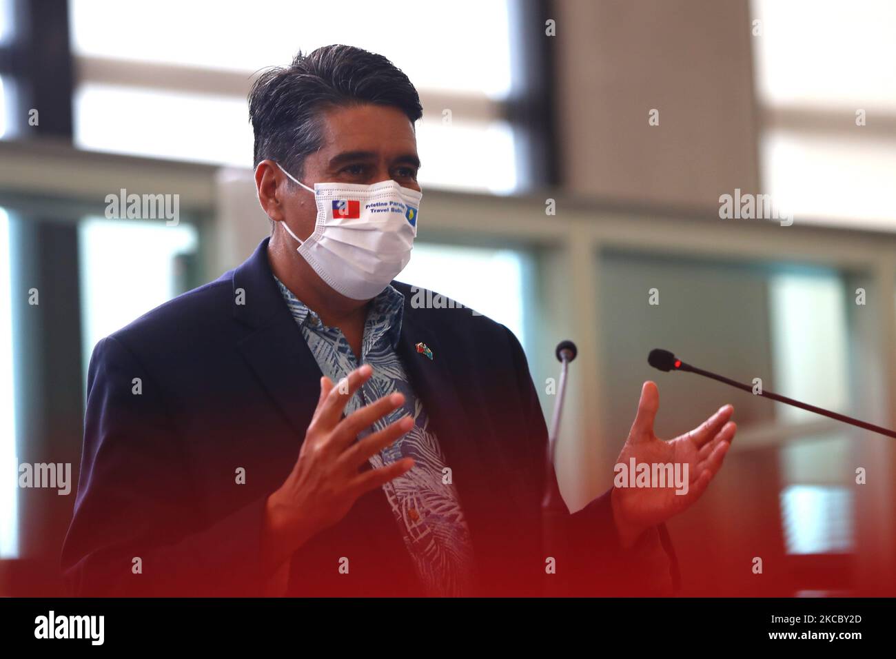 Palau President Surangel Whipps Jr. wearing a Palau-Taiwan flag mask ...