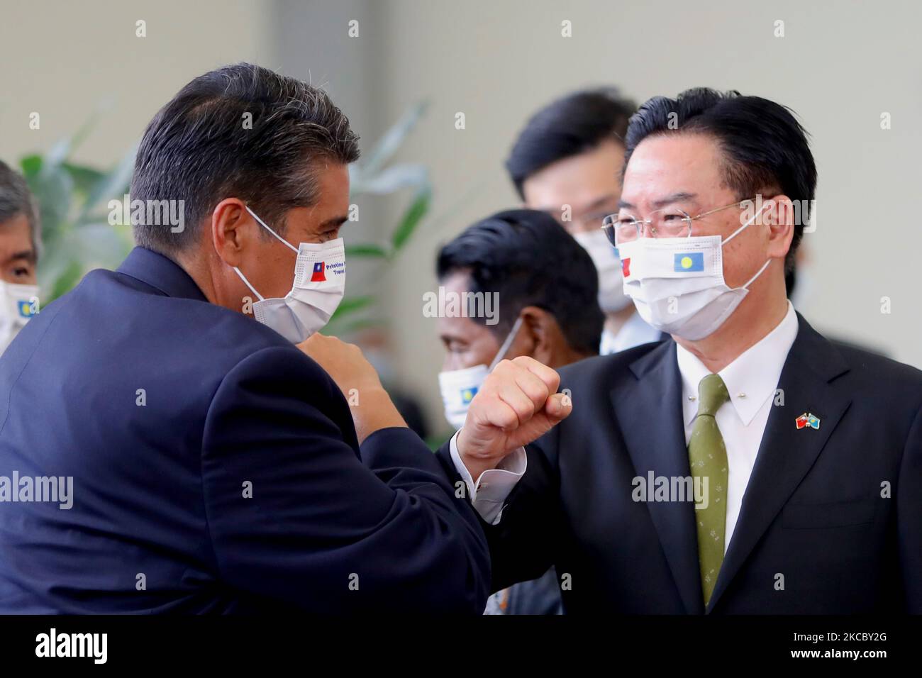 Palau President Surangel Whipps Jr. (L) wearing a Palau-Taiwan flag ...