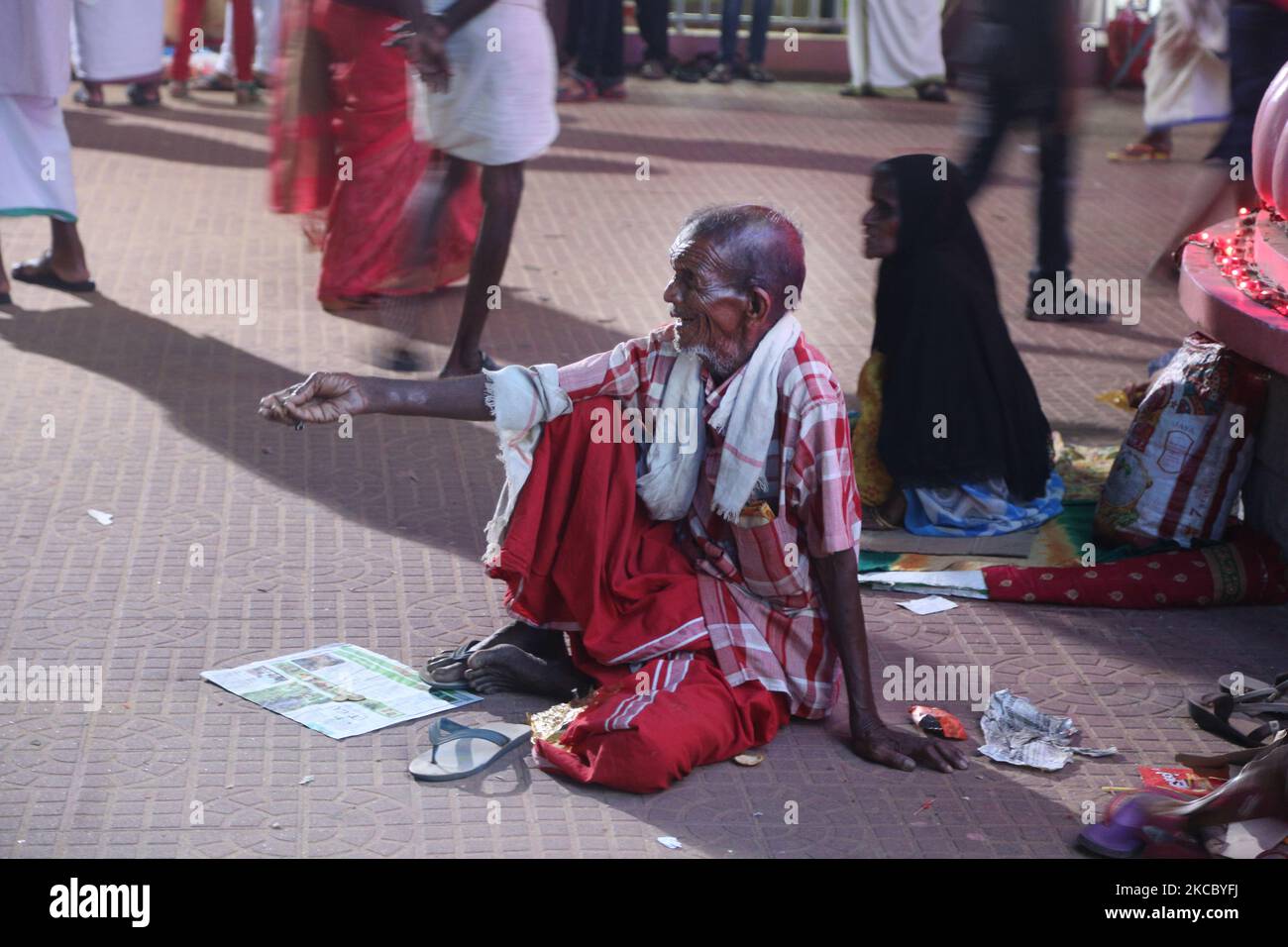 Men begging for alms outside the Beemapally Mosque (Beemapally Dargah ...