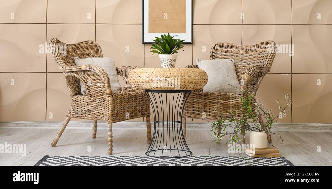 Interior of modern room with rattan furniture Stock Photo - Alamy