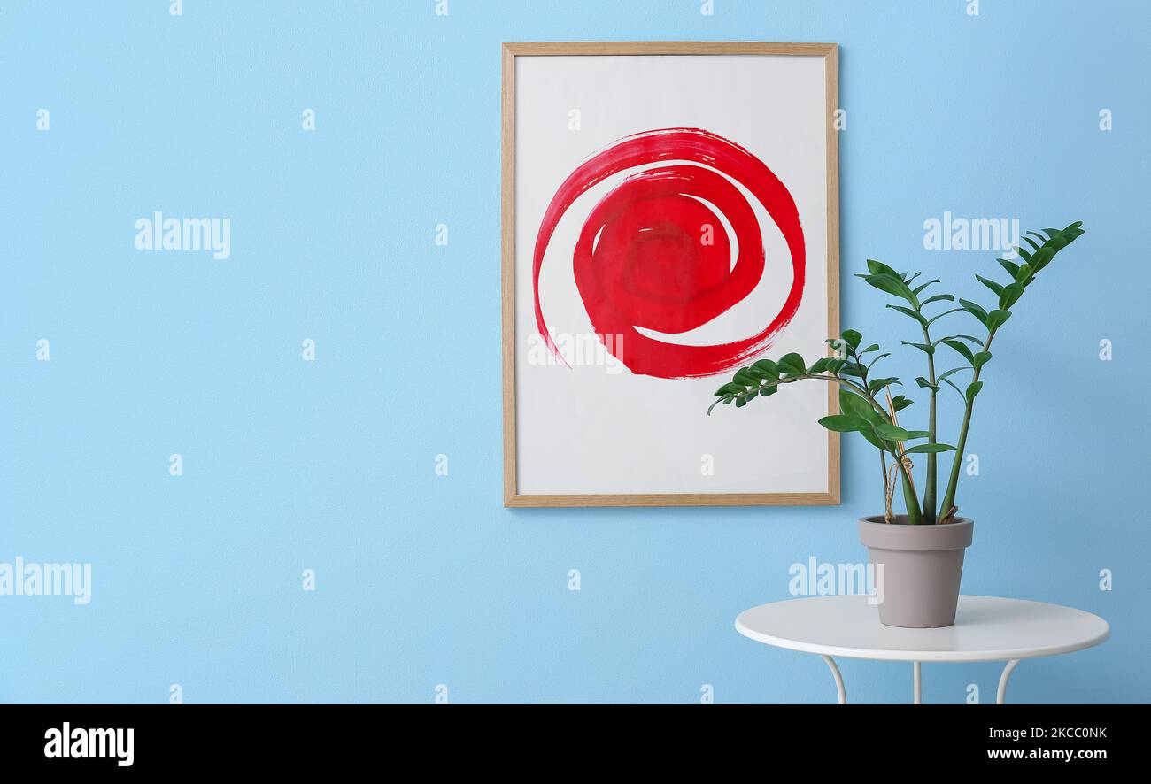 Creative picture of Japanese flag on light blue wall in interior of ...