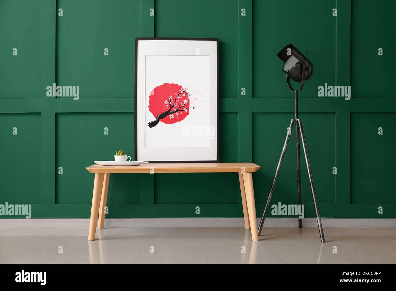 Creative picture of Japanese flag near green wall in interior of ...