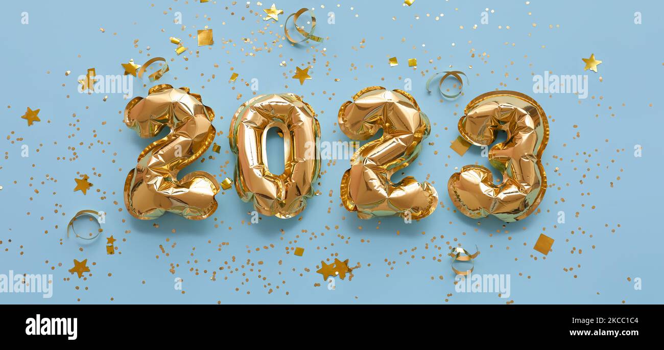 Figure 2023 made of balloons on light blue background Stock Photo - Alamy