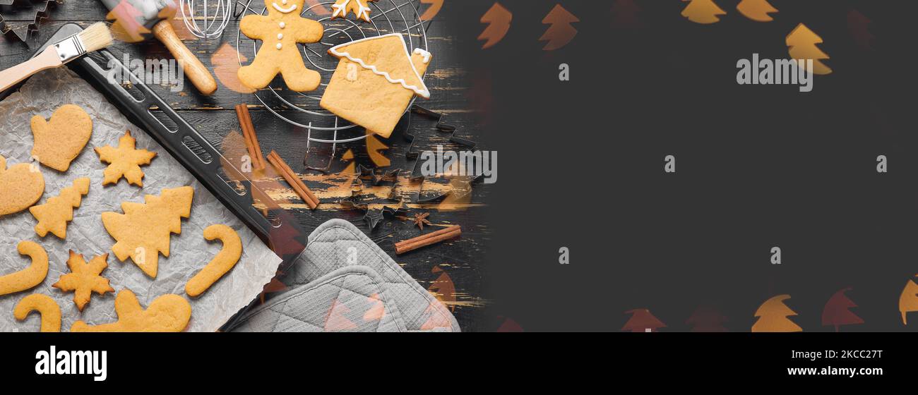 Banner with Christmas gingerbread cookies on dark background with space ...