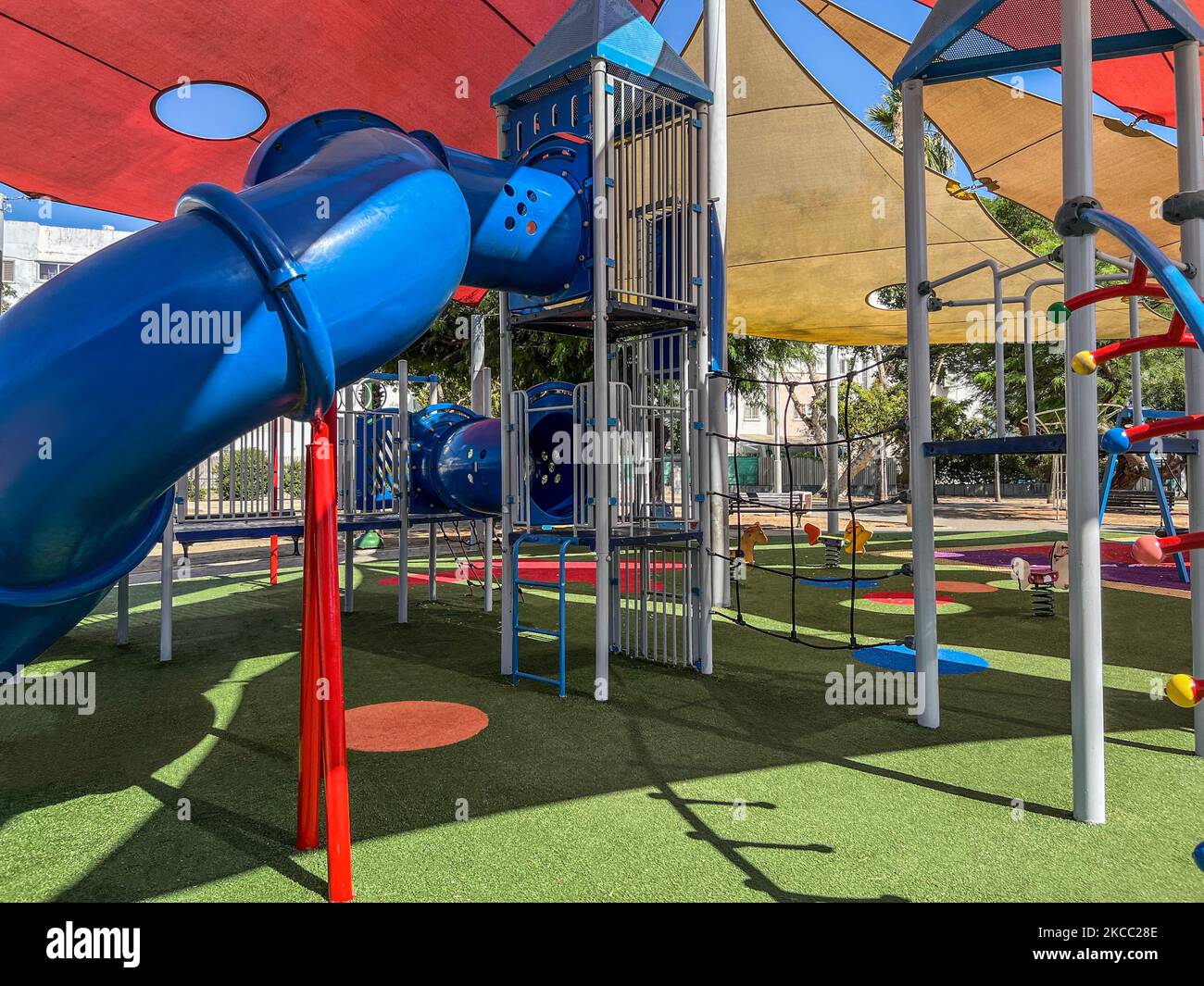 View of children's complex on playground Stock Photo - Alamy
