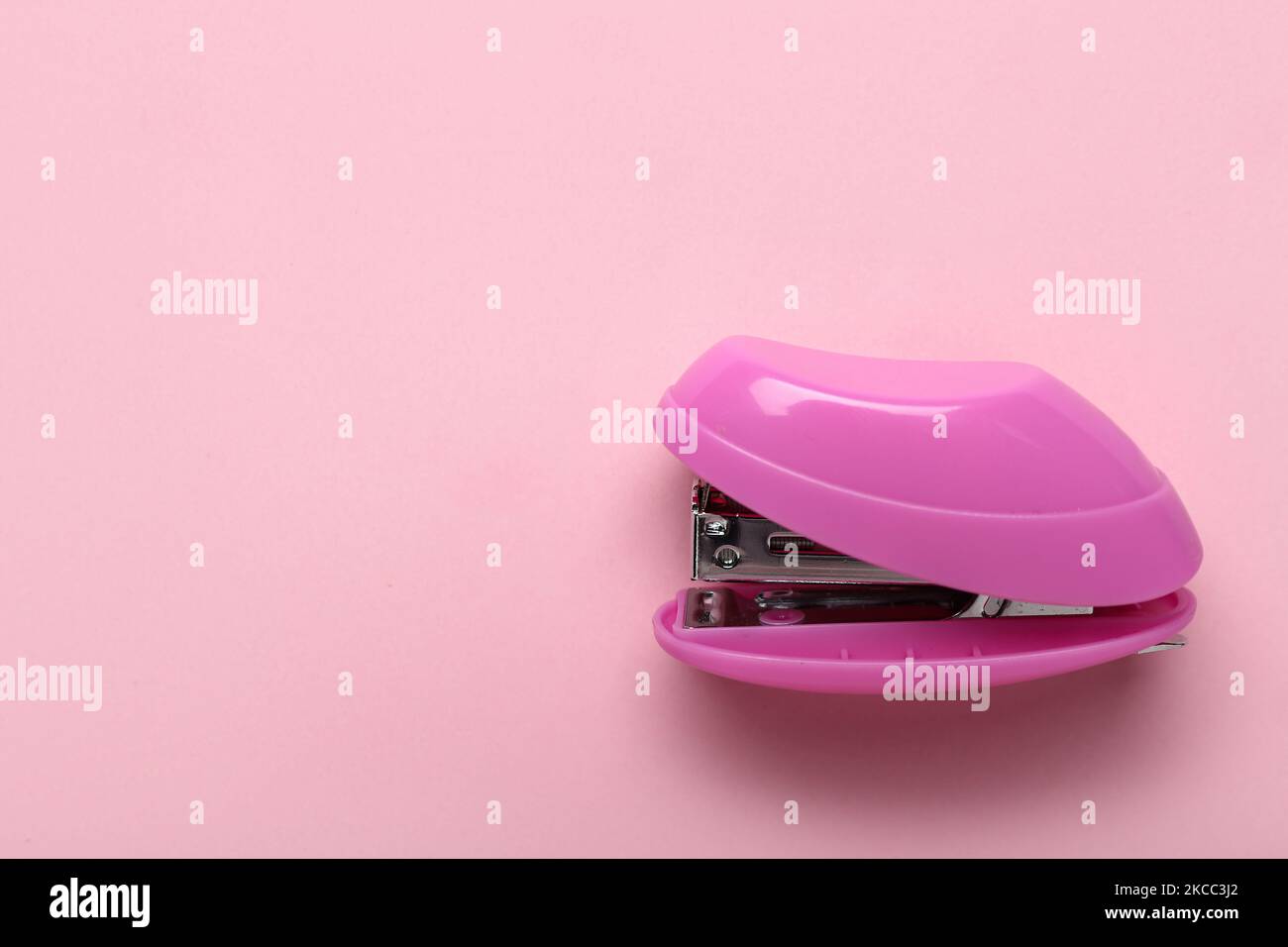 Pink stapler tool office hi-res stock photography and images - Alamy