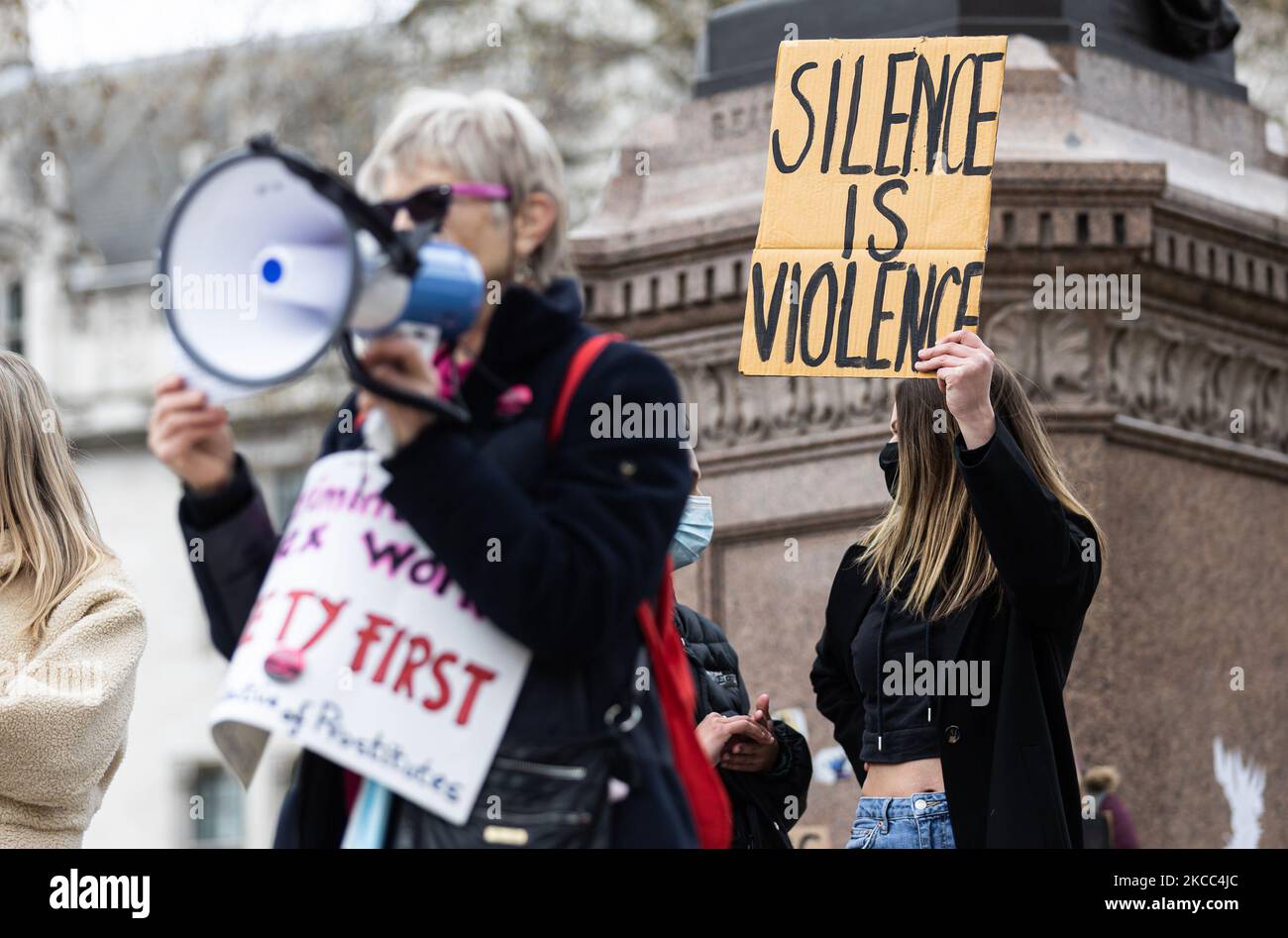 Women's rights Protestors rally to in Parliament Square, London ...