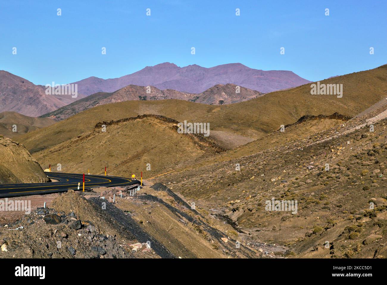Mountain road winding through the High Atlas Mountains in Morocco ...