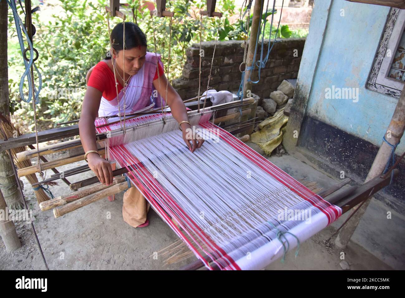 Assamese Women busy in weaving traditional assamese gamosa ahead of ...