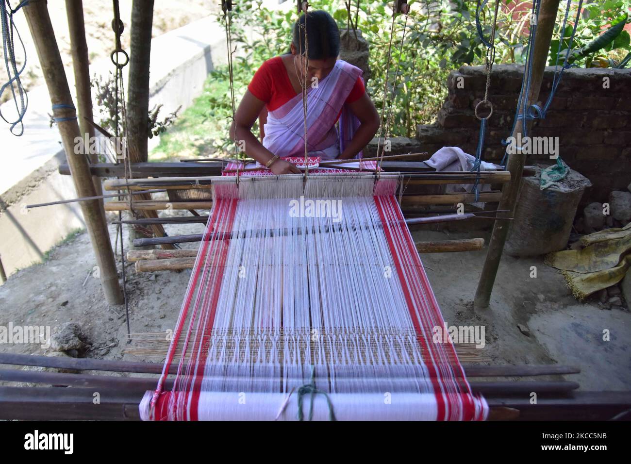 Assamese Women busy in weaving traditional assamese gamosa ahead of ...