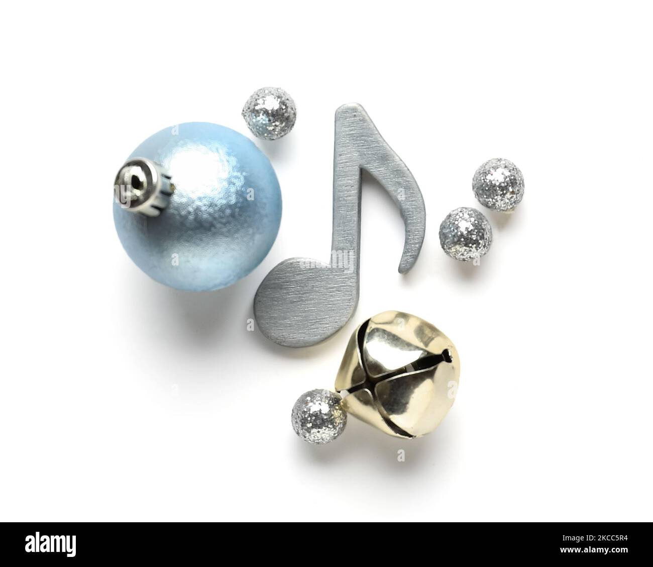 Note sign with Christmas balls and bell on white background Stock Photo ...